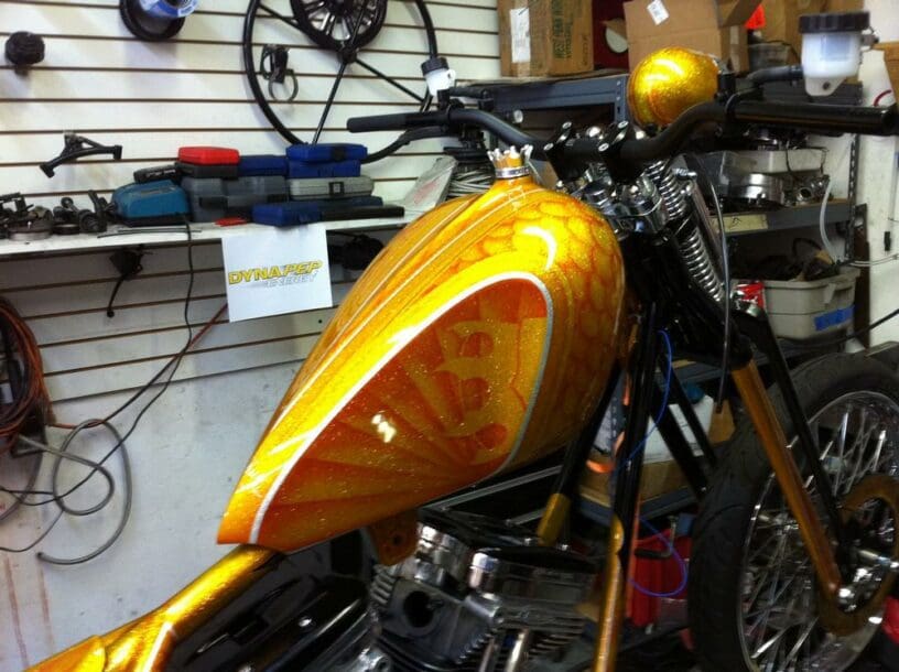 Metallic gold CFL built by Thug Custom Cycles of U.S.A.